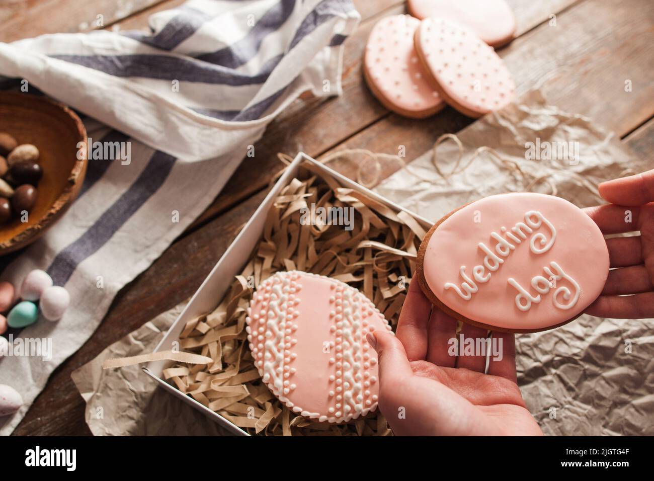 Packing sweets into gift box free space Stock Photo - Alamy