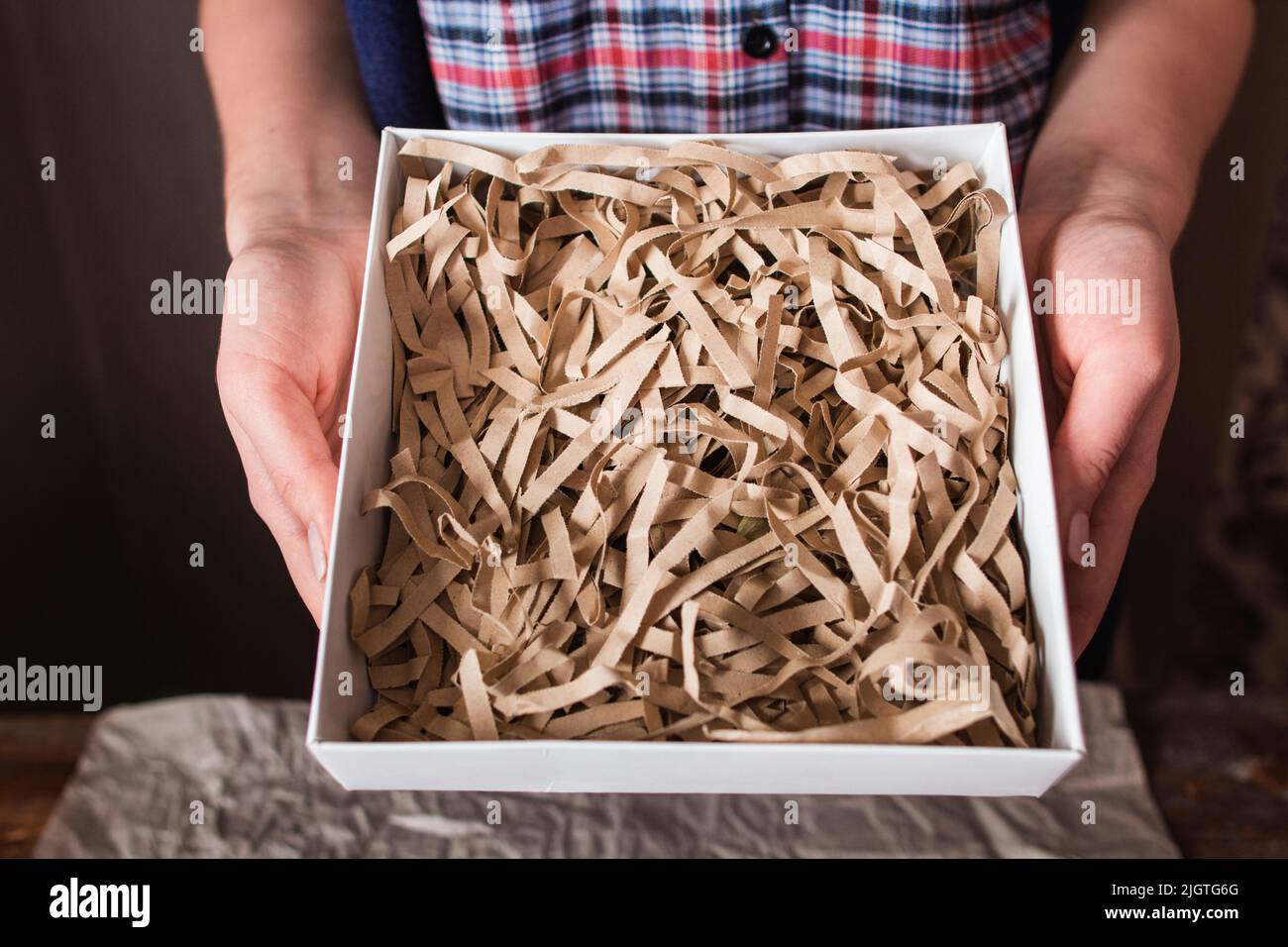 Empty gift box in female hands closeup void Stock Photo - Alamy
