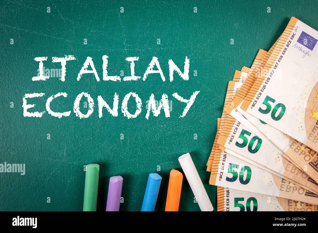 Italian Economy. Text and euro money on a green chalkboard Stock Photo ...