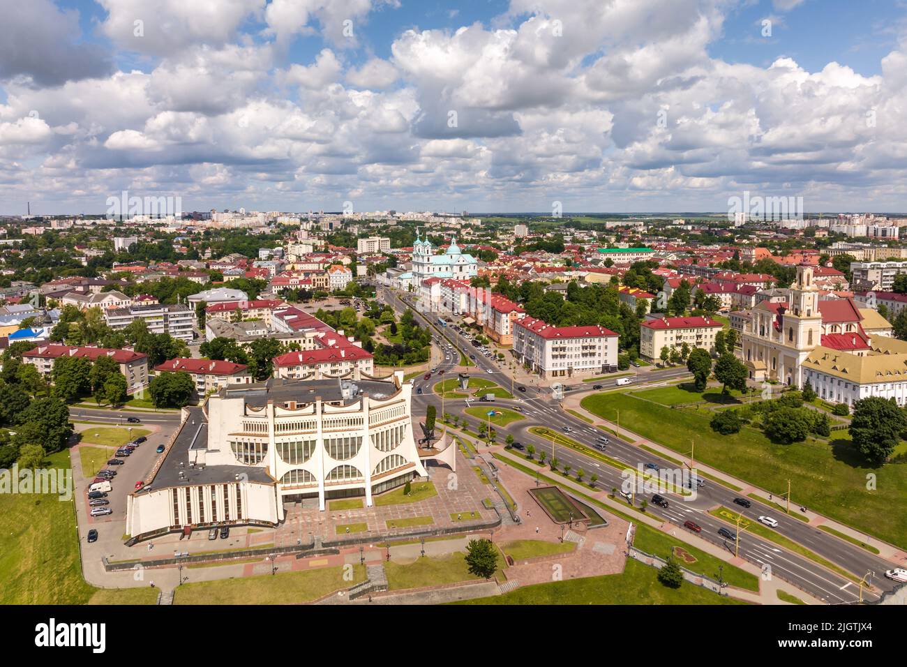 aerial panoramic view from great height on red roofs of old big city ...