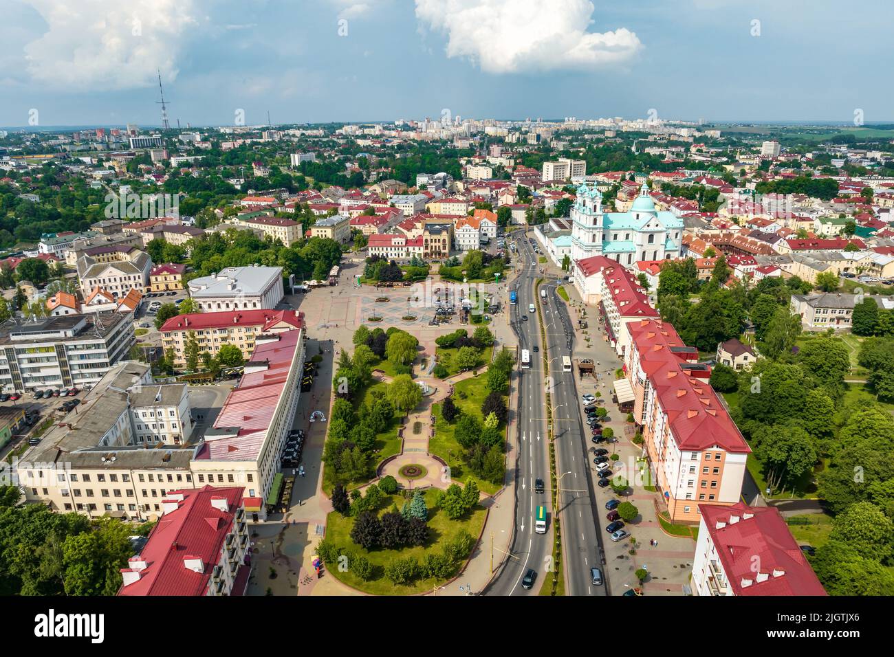 aerial panoramic view from great height on red roofs of old big city ...