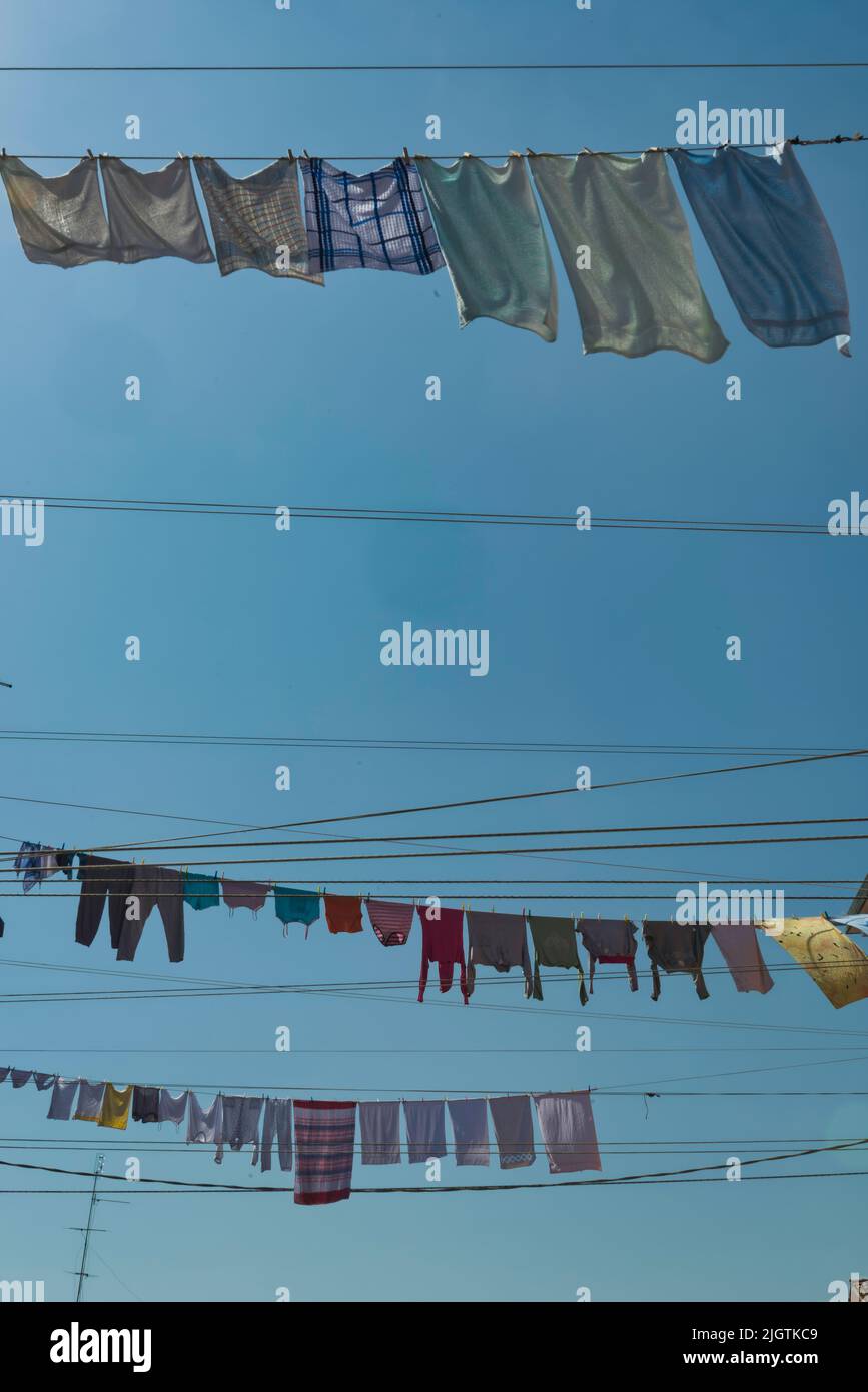 Clothes on wires hi-res stock photography and images - Alamy