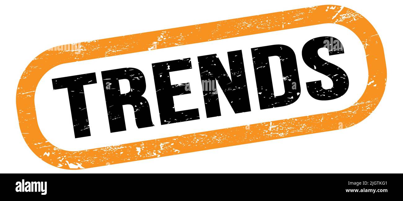 TRENDS, text on orange-black rectangle stamp sign Stock Photo - Alamy