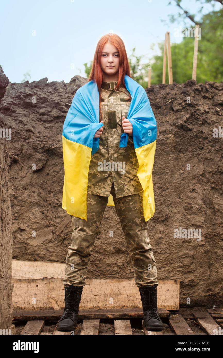 Ukrainian girl in the uniform of the armed forces of Ukraine in a ...
