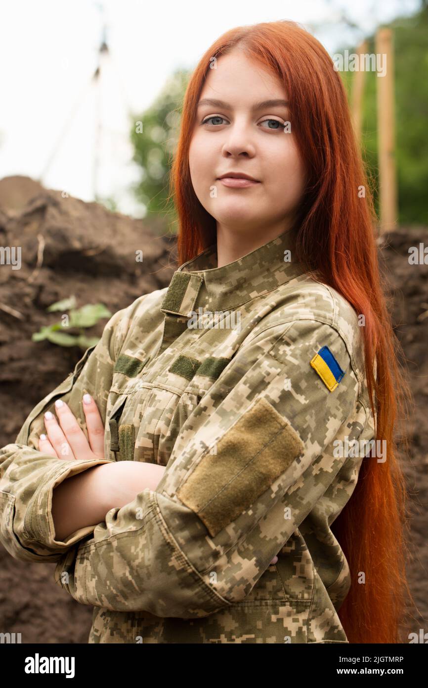 Ukrainian girl in the uniform of the armed forces of Ukraine in a ...