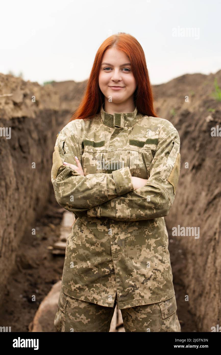 Ukrainian girl in the uniform of the armed forces of Ukraine in a ...