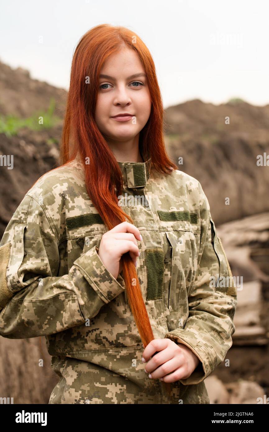 Ukrainian girl in the uniform of the armed forces of Ukraine in a ...