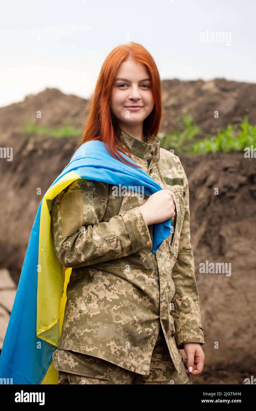 Ukrainian girl in the uniform of the armed forces of Ukraine in a ...