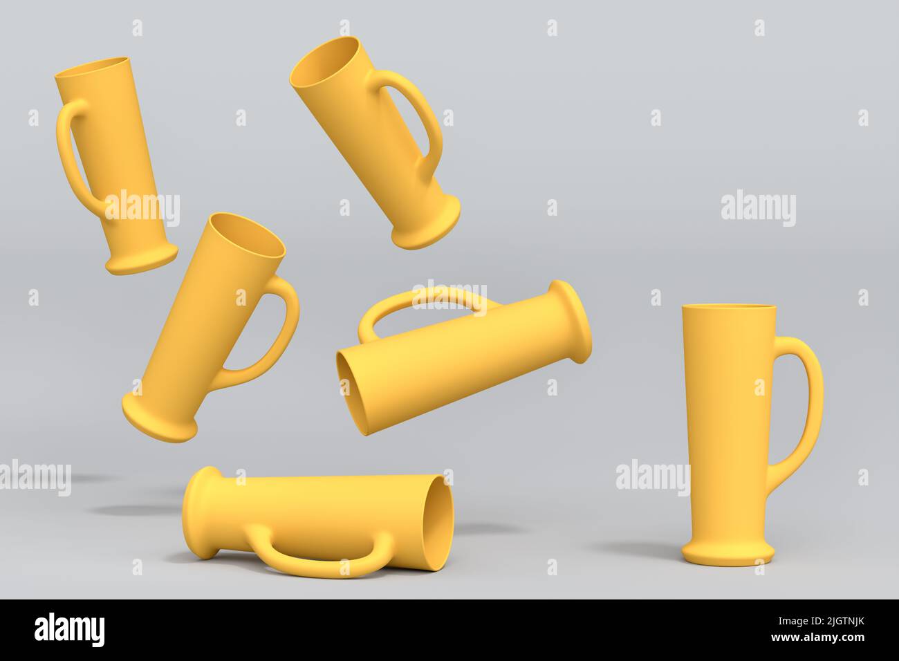 Set of yellow glasses of fresh draft beer on a grey monochrome ...