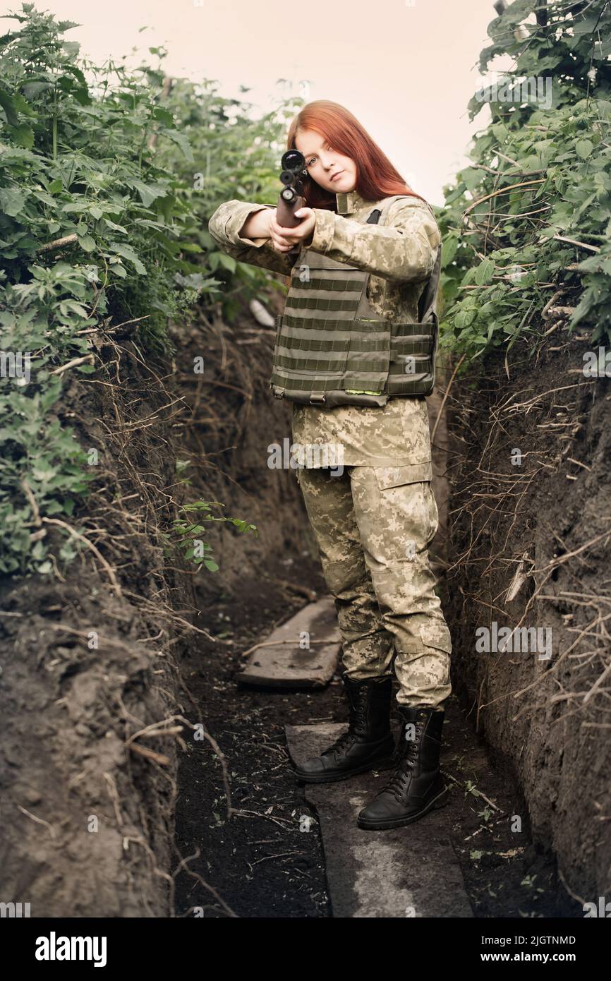 Red haired girl in army uniform hi-res stock photography and images - Alamy