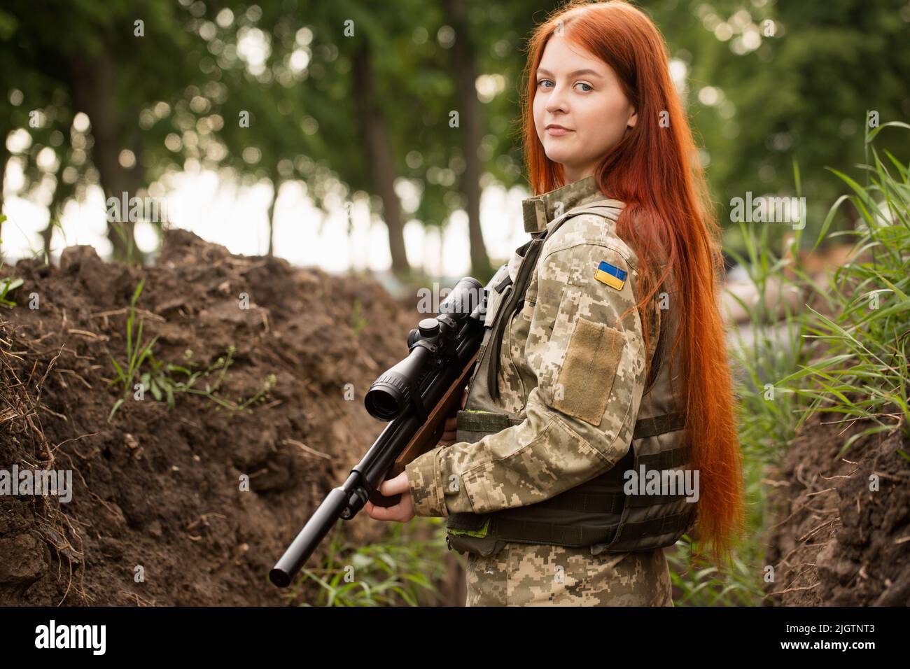 Red haired girl in army uniform hi-res stock photography and images - Alamy