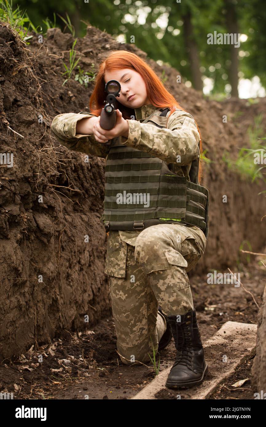 Red haired girl in army uniform hi-res stock photography and images - Alamy