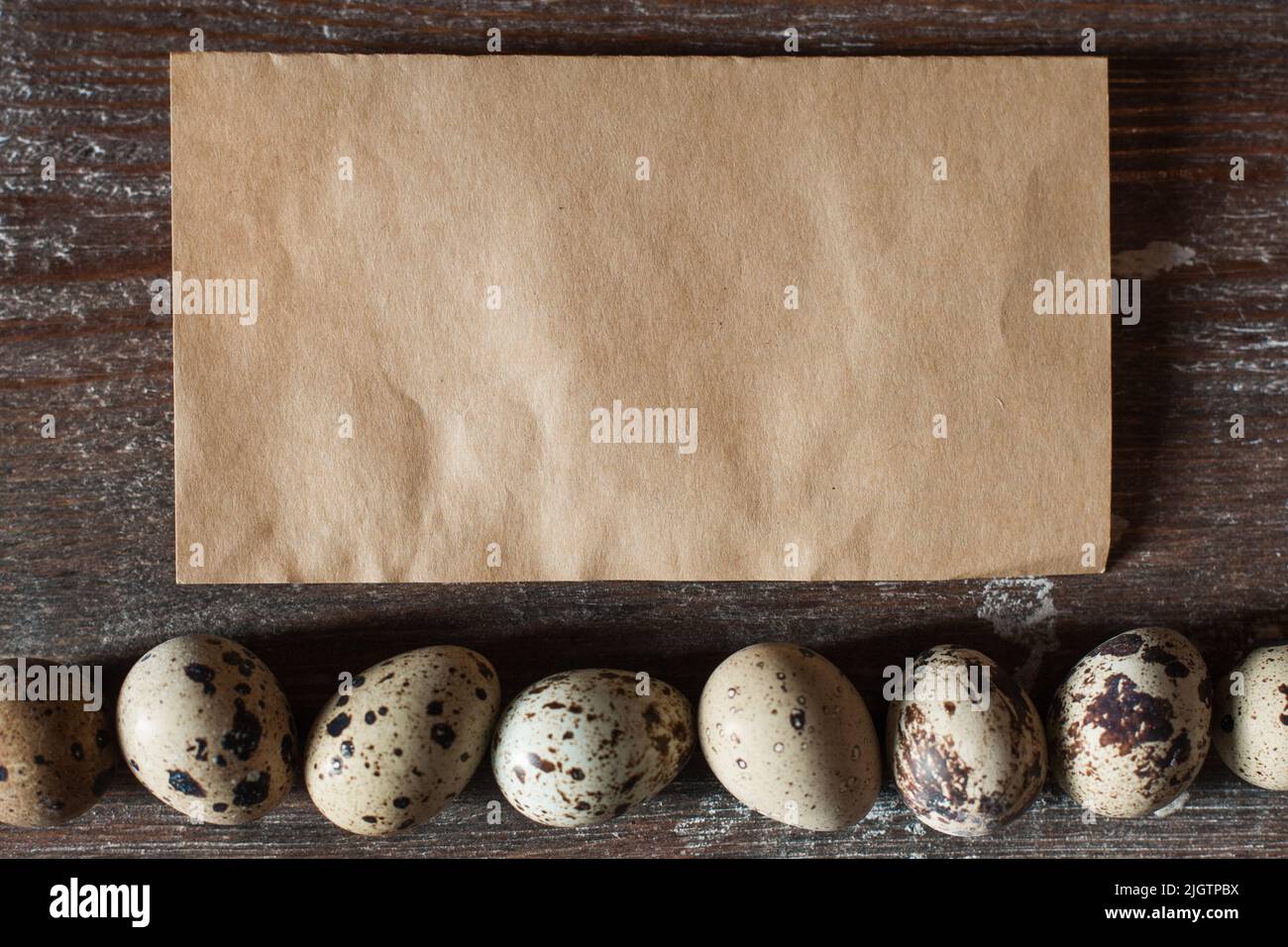 Blank vintage paper with quail eggs flat lay Stock Photo - Alamy