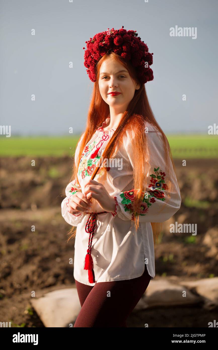 Unbreakable Ukraine. Portrait of a red-haired Ukrainian woman in an ...