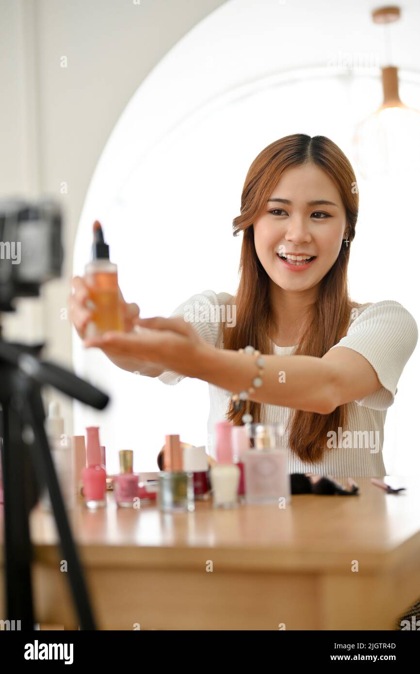 Attractive and gorgeous young Asian female beauty blogger or influencer ...
