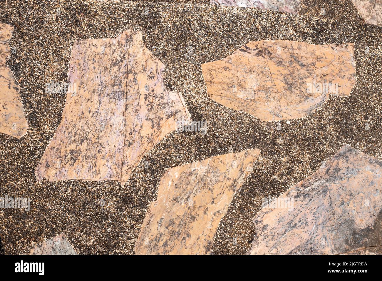 decorative background large polished stones of uneven shape, place for ...