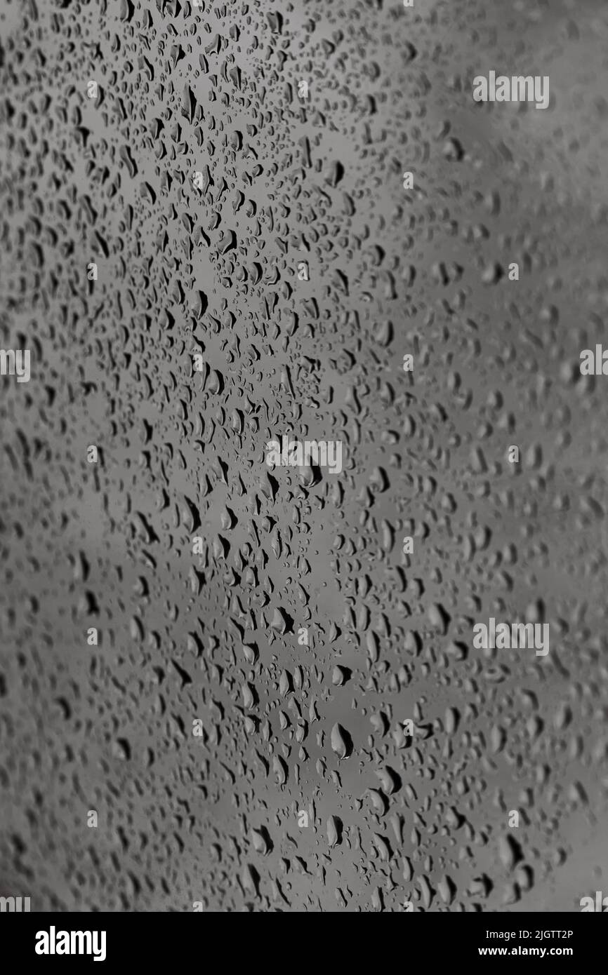 Water drops on glass, monochrome photo Stock Photo - Alamy