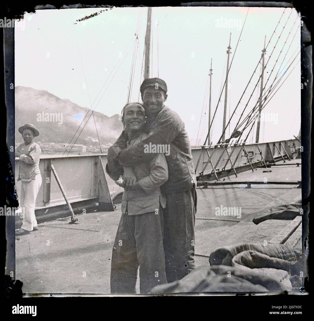 Two men on a ship Stock Photo - Alamy