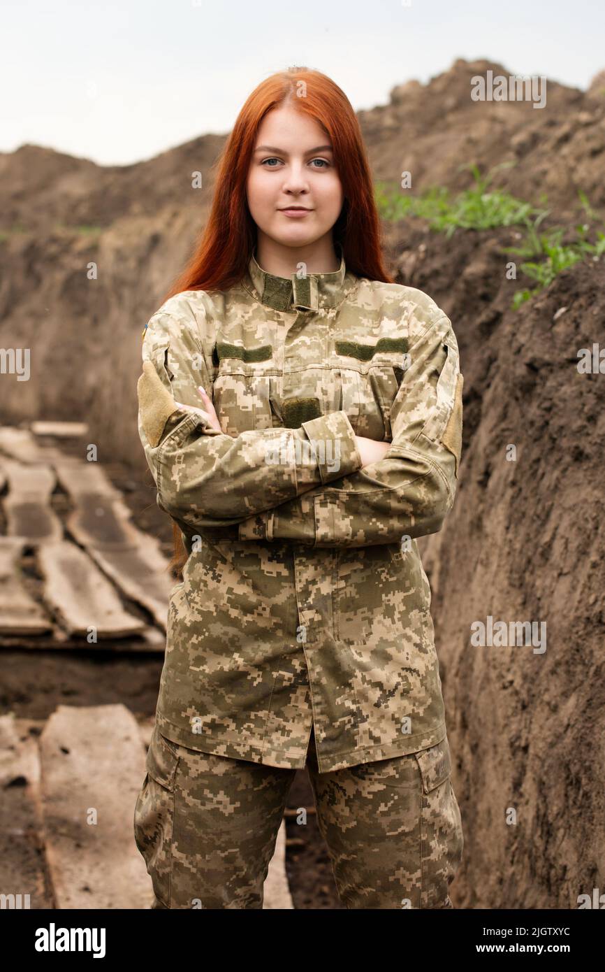 Ukrainian girl in the uniform of the armed forces of Ukraine in a ...