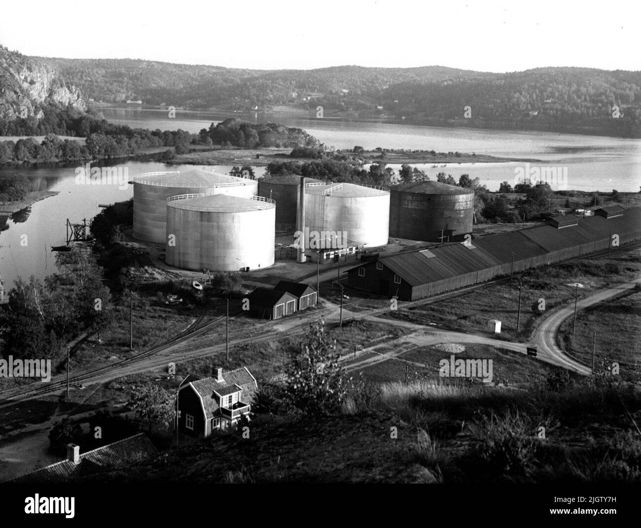 Munkedal harbor early 1950s. Behind the magazine is oil cisterns with a ...