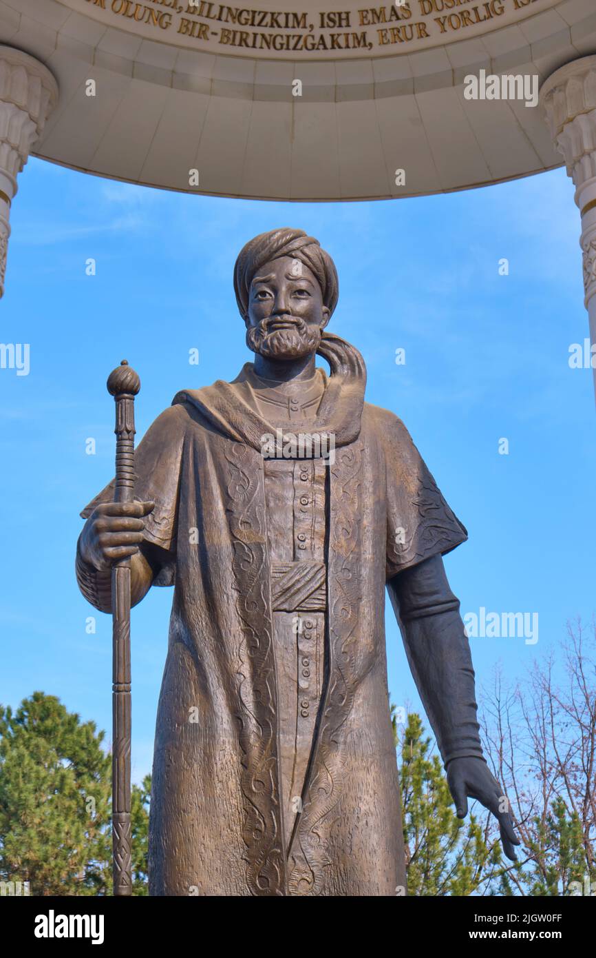 The main blue dome covered pavillion with a bronze statue of a standing ...