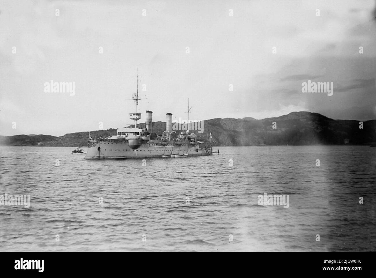 German armored boat. 1903. A larger warships have anchored in a fjord ...