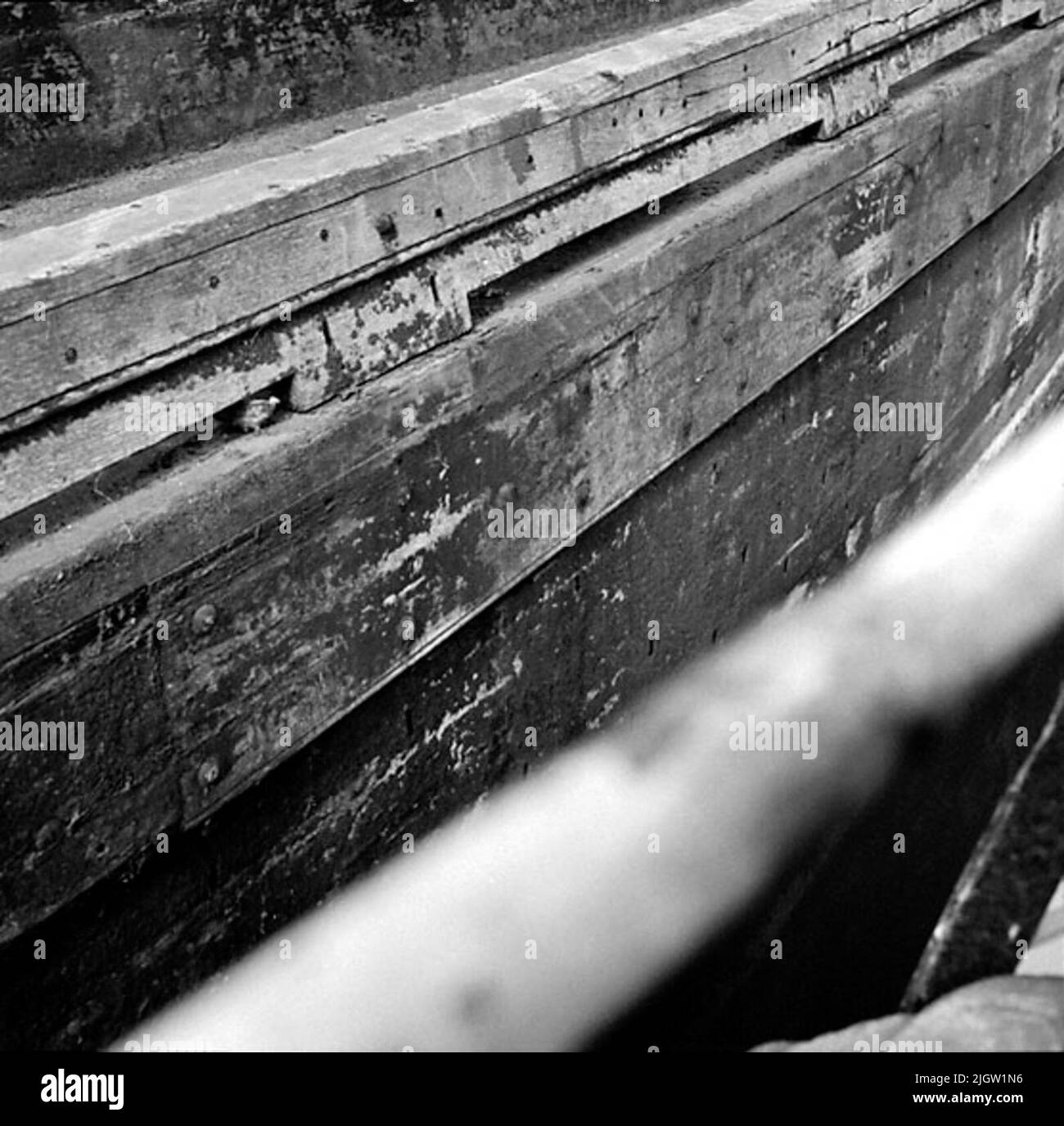 One long side of a boat. The joint between the table and the railing is ...