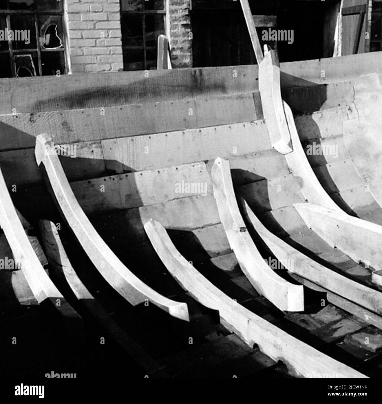 A boat is being built and is located on one lap. Close -up of spant and ...