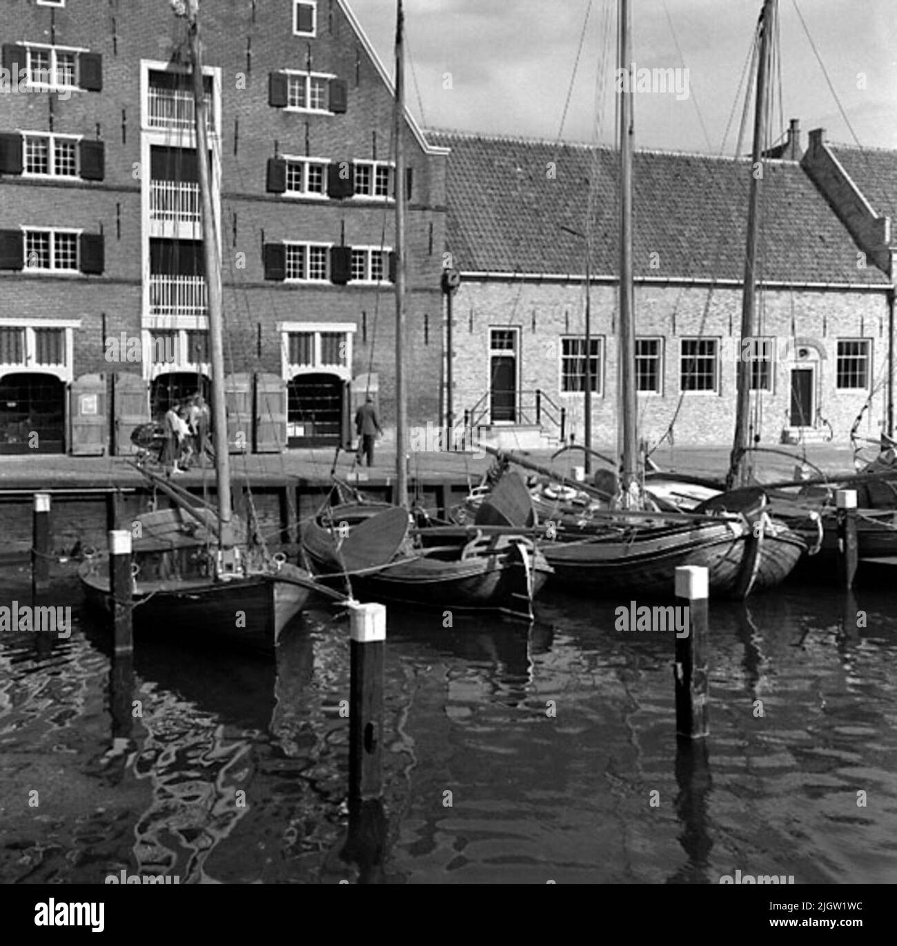 Several boats moored in Black and White Stock Photos & Images - Alamy
