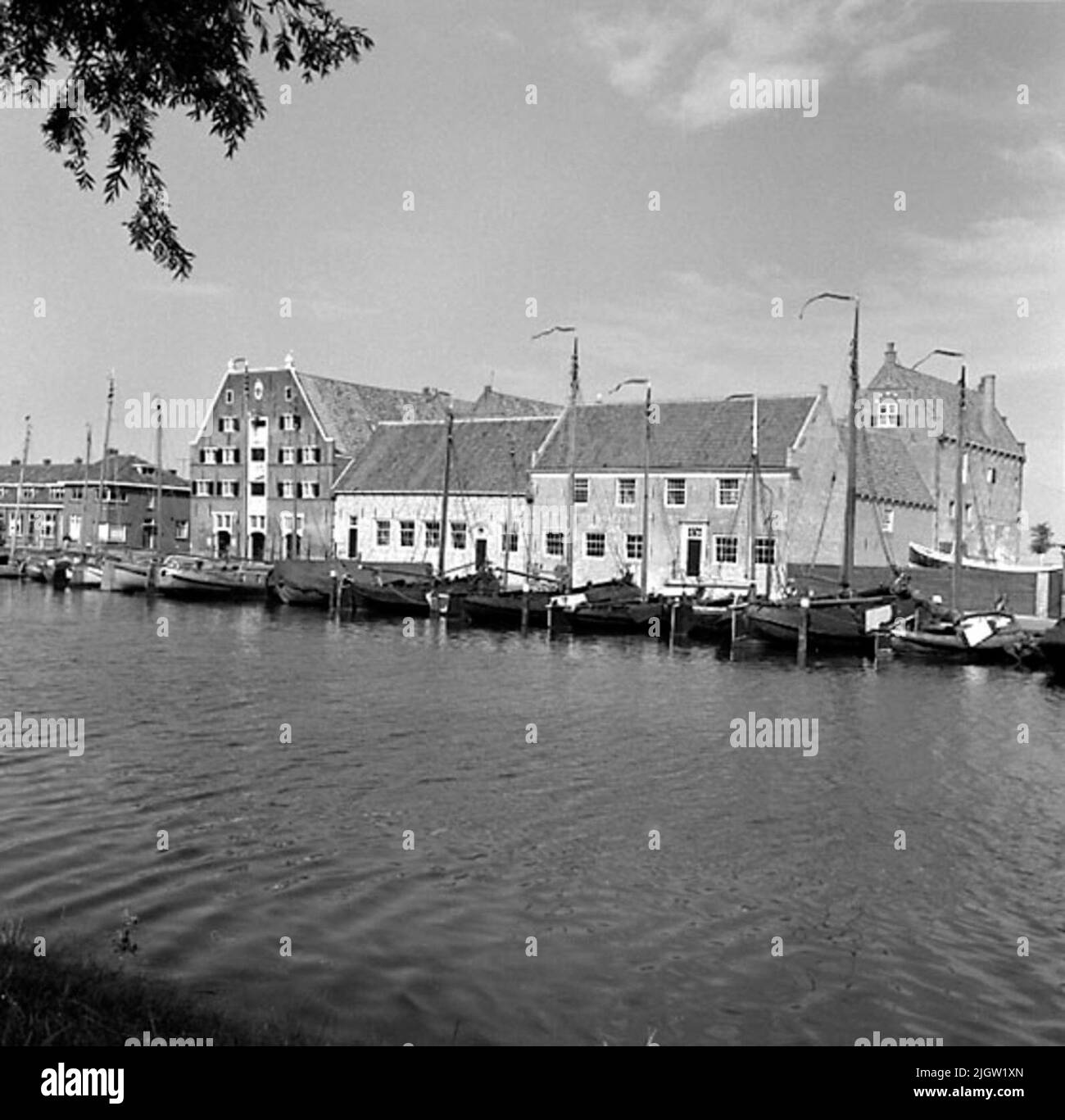 Several boats moored in Black and White Stock Photos & Images - Alamy