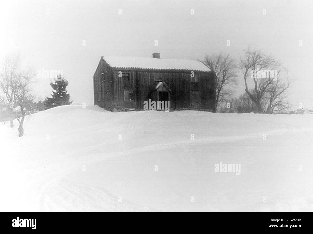 Stamped on the back: H-photo, J065. An old manor building with wooden ...