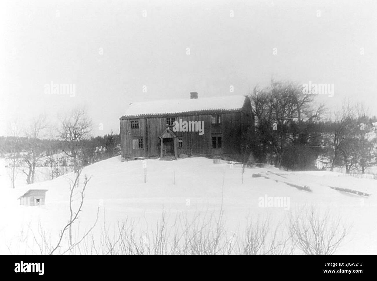 Stamped on the back: H-photo, J063. An old manor building with wooden ...