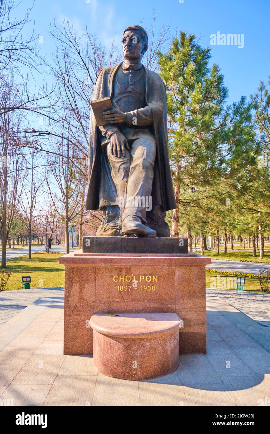 A bronze statue of a leaning Cholpán, famous writer and poet. At ...