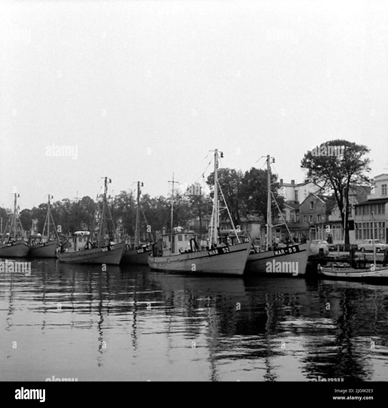 Several boats moored in Black and White Stock Photos & Images - Alamy