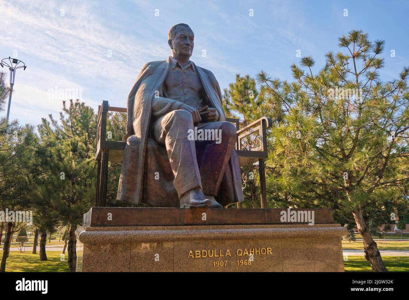 A bronze statue of a sitting Abdulla Qahhor, famous writer. At Alisher ...