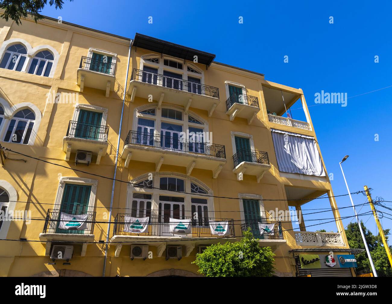 Old yellow renovated heritage building in the city, Beirut Governorate ...