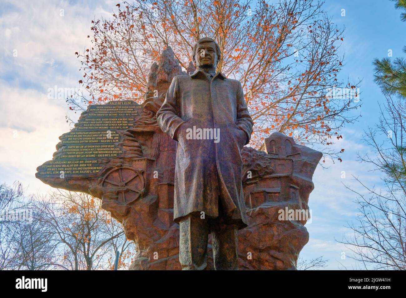 A bronze statue of a standing Muhammad Yusuf, famous writer and poet ...