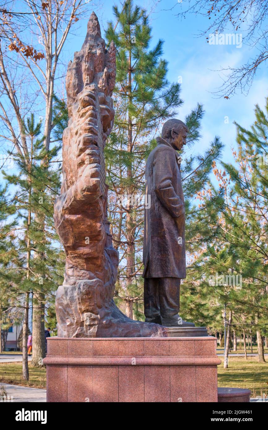 A bronze statue of a standing Muhammad Yusuf, famous writer and poet ...