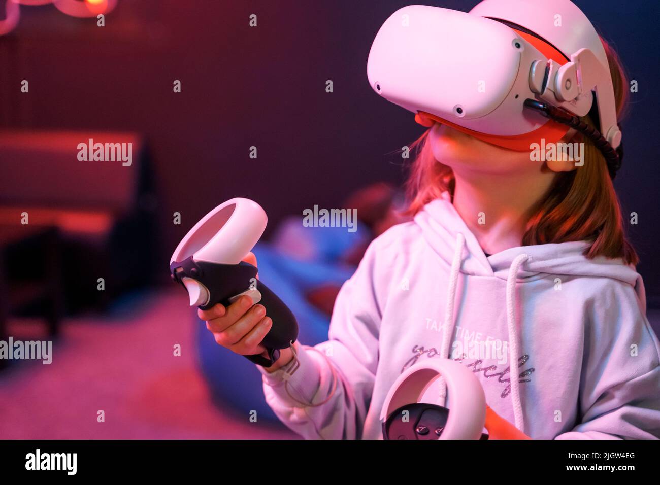 Girl playing vr game in 3d glasses headset. Virtual reality simulation ...