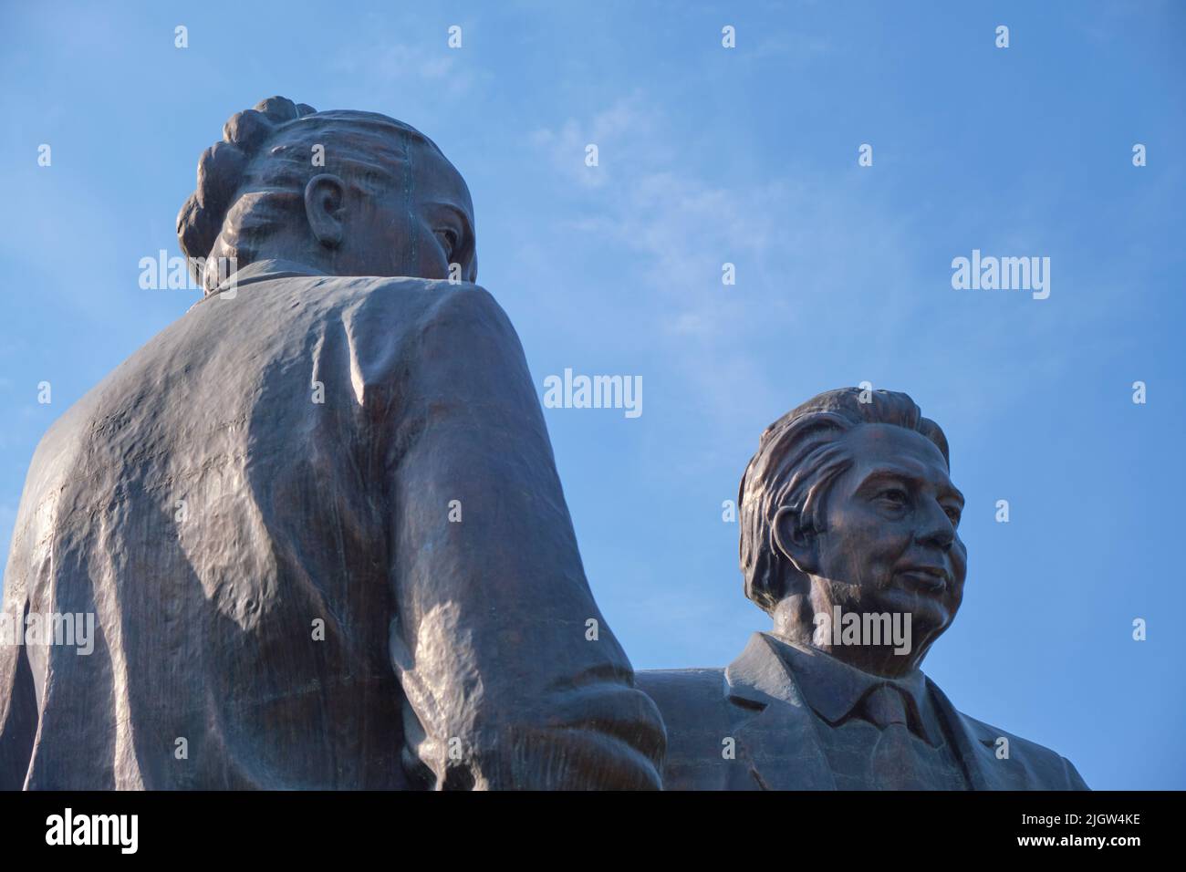 A bronze statue of a sitting Saida Zunnunova and Said Ahmad, famous ...