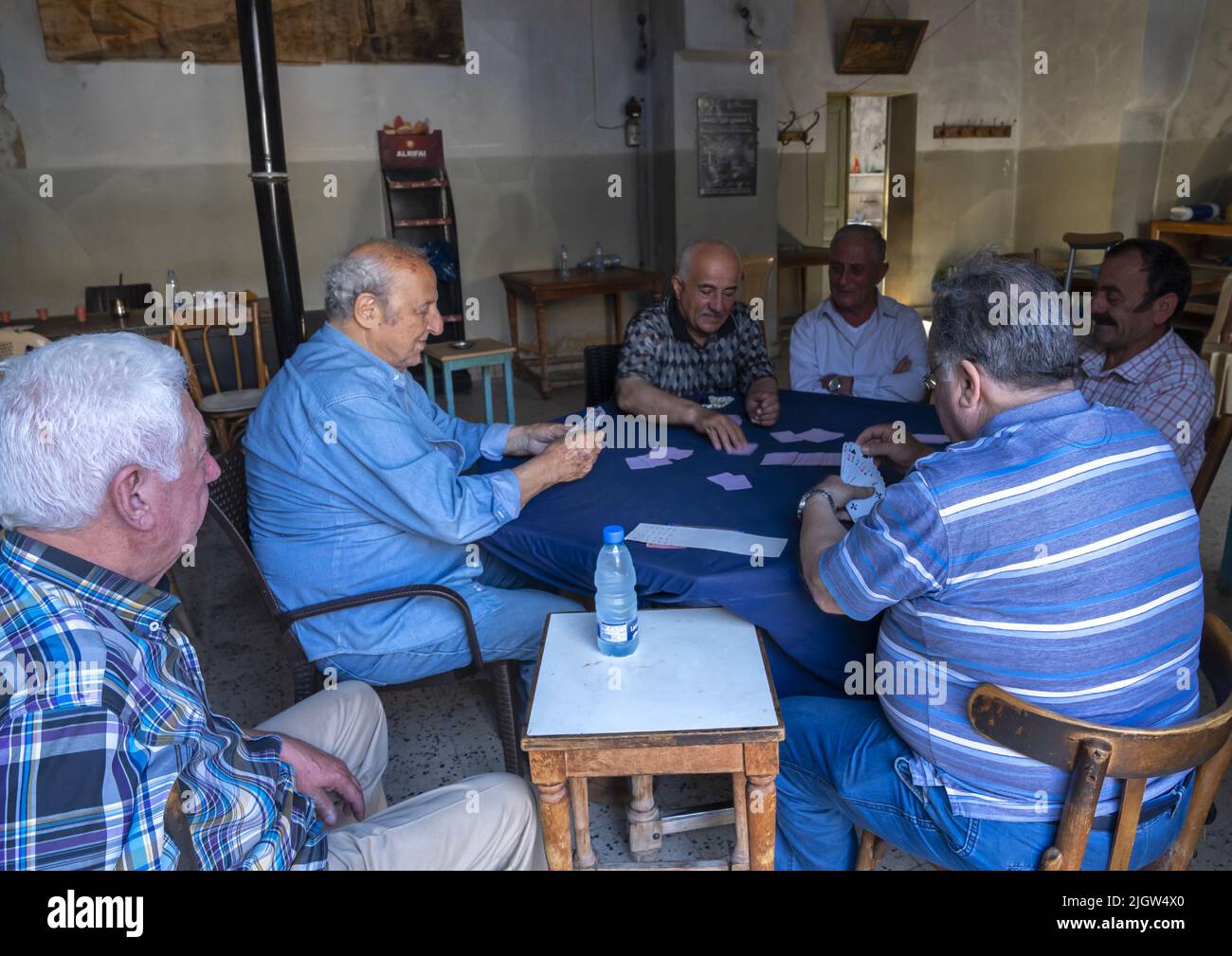 Lebanese men playing cards in a café, Mount Lebanon, Douma, Lebanon ...