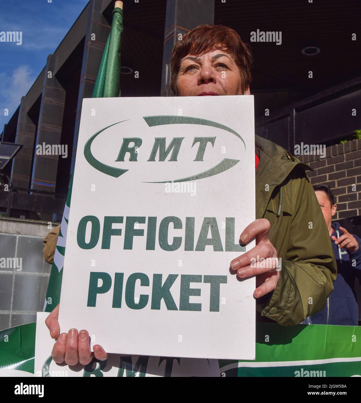 London, UK. 25th June 2022. An RMT union member outside Euston Station ...