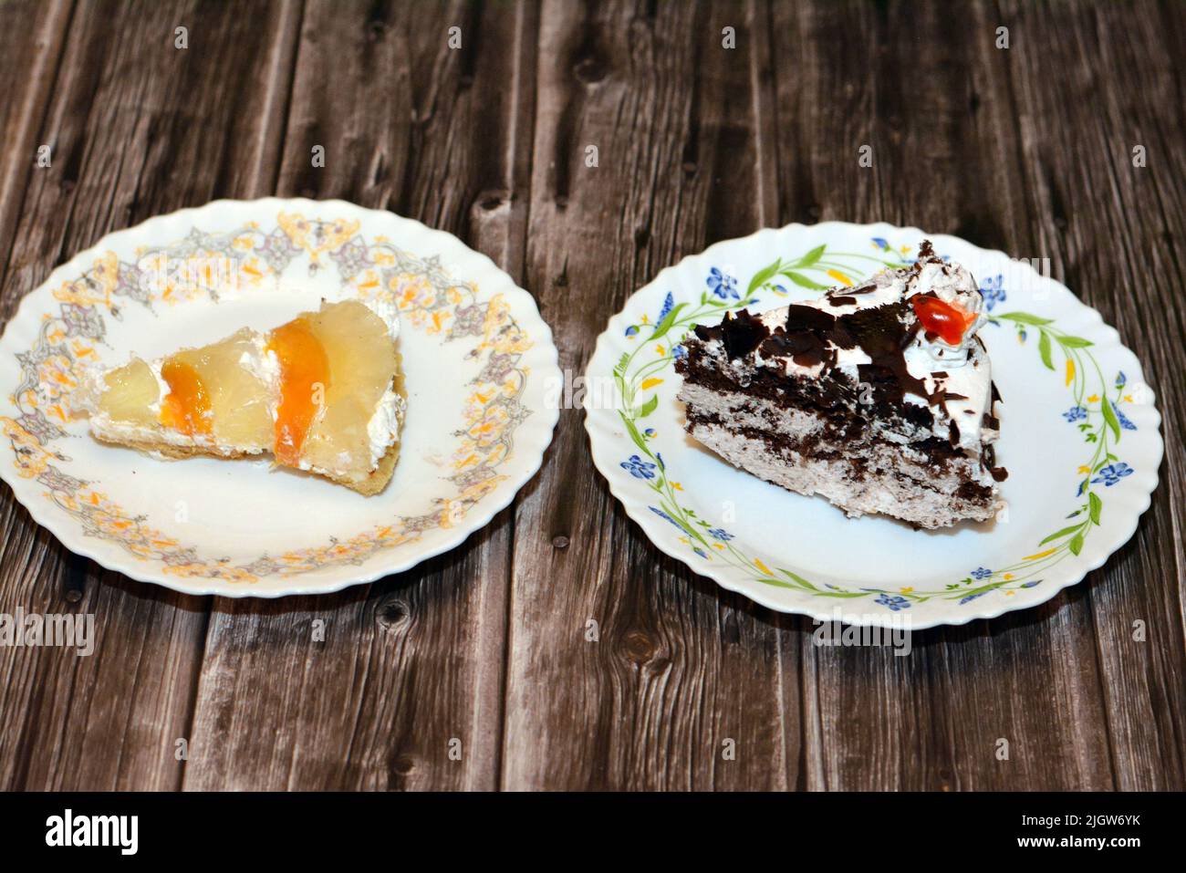 A sliced piece of black forest cake, a chocolate sponge cake layered ...