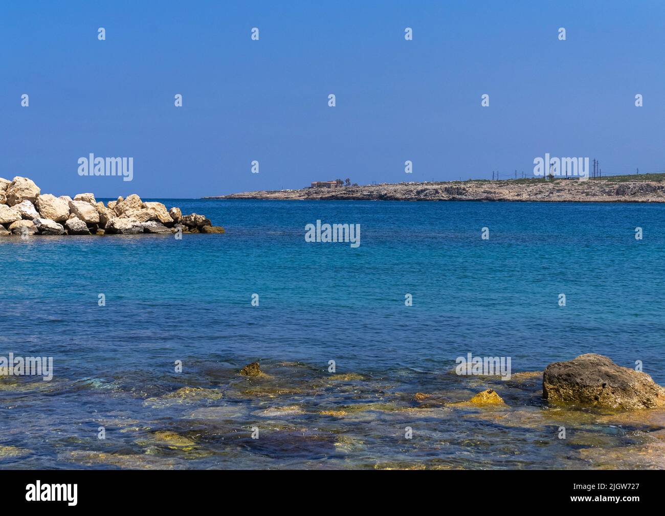 Seashore with blue water, North Governorate, Anfeh, Lebanon Stock Photo ...