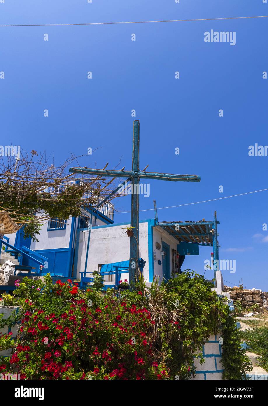 Cross in front of a restaurant, North Governorate, Anfeh, Lebanon Stock ...