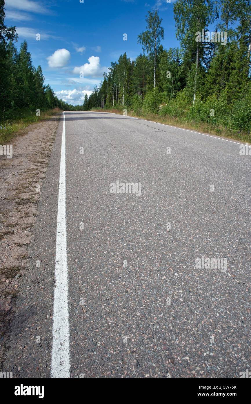 Empty asphalt road in rural landscape, Finland Stock Photo - Alamy