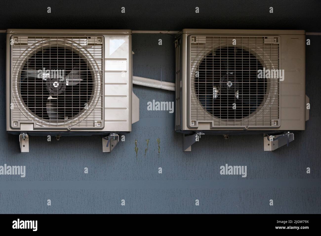 air conditioning unit Central split system hanging outside the building ...