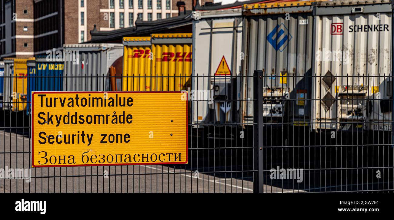 Security zone sign on a fence in Katajanokka harbour, Port of Helsinki ...
