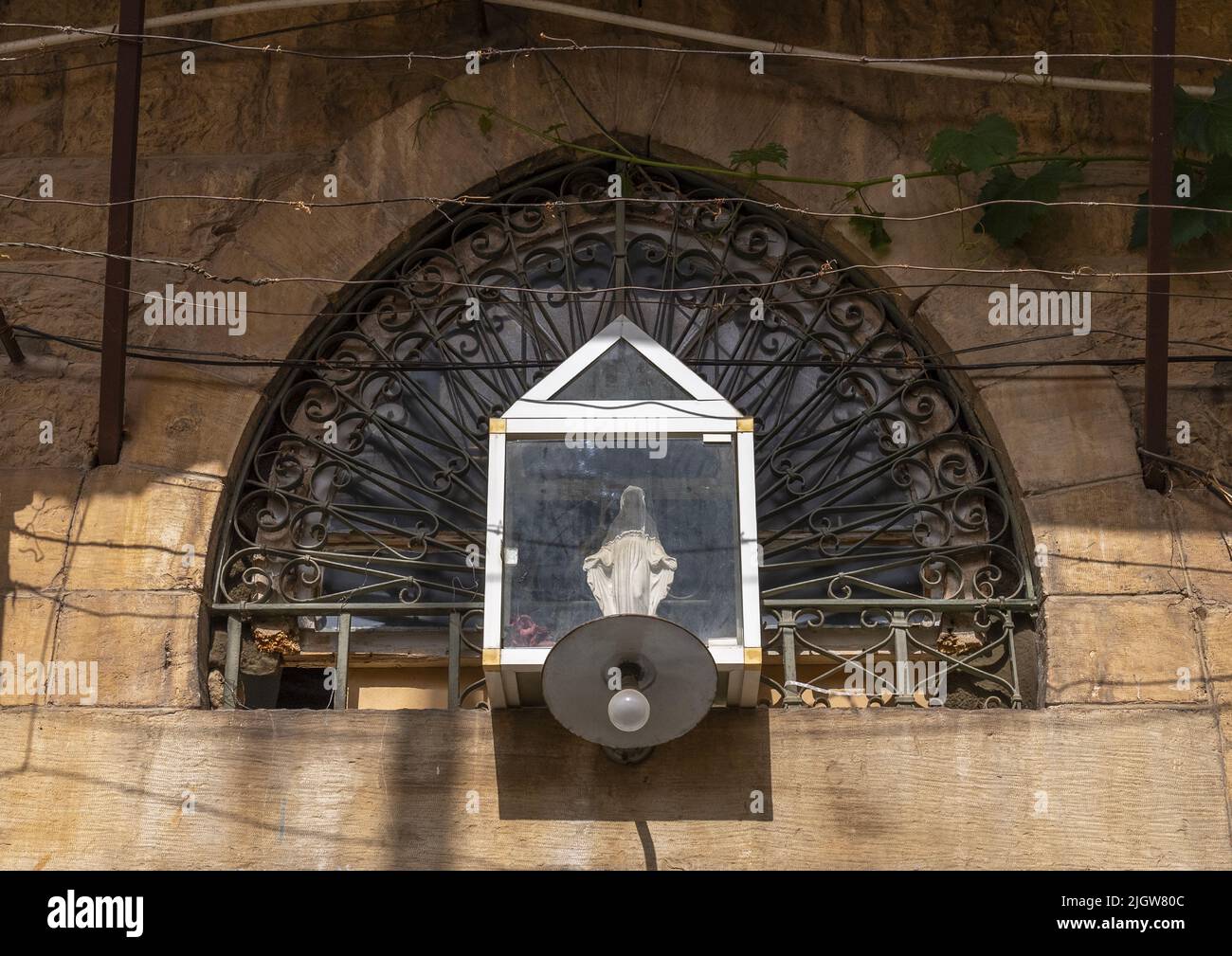 Virgin Maria statue above the entrance of a house, Beqaa Governorate ...