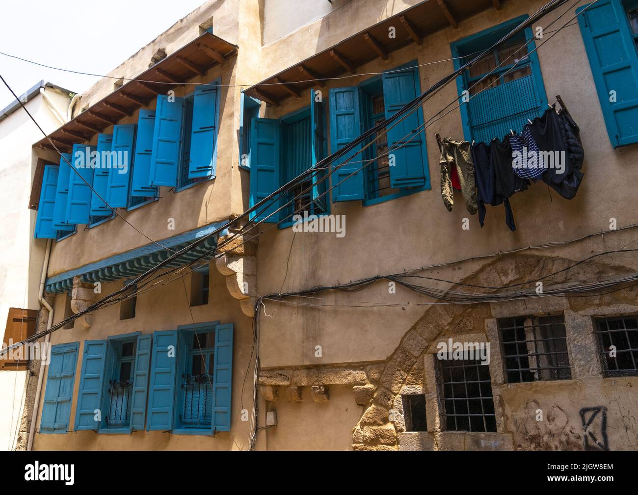 Old traditional lebanese house with blue windows, North Governorate ...